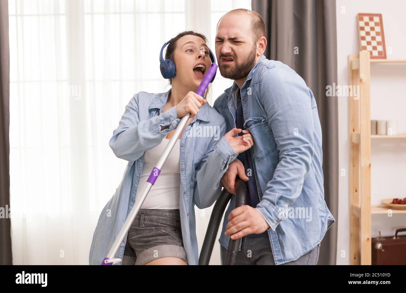 Couple dancing cleaning hi-res stock photography and images - Alamy