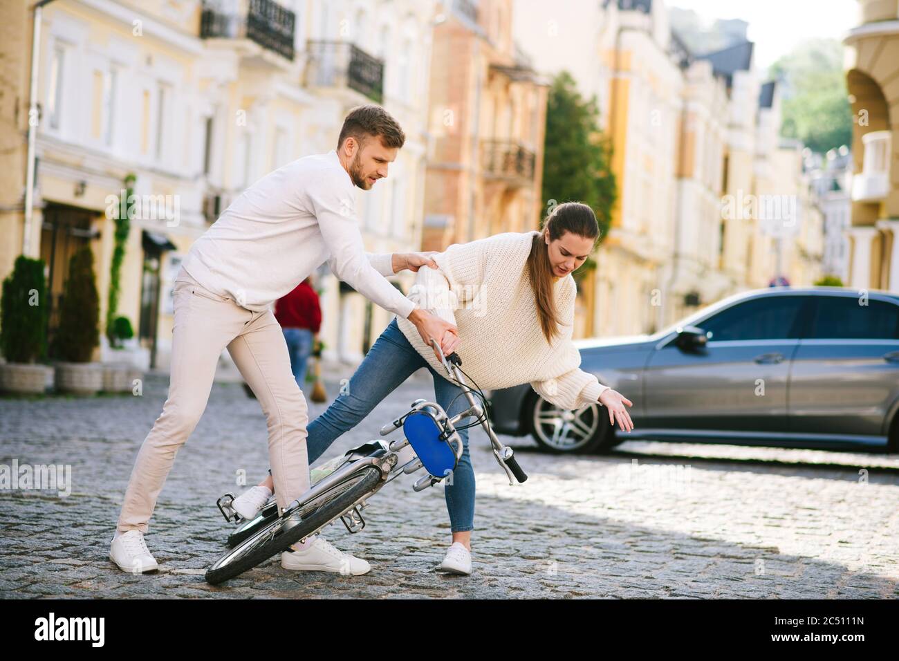 Raising his bike hi-res stock photography and images - Alamy
