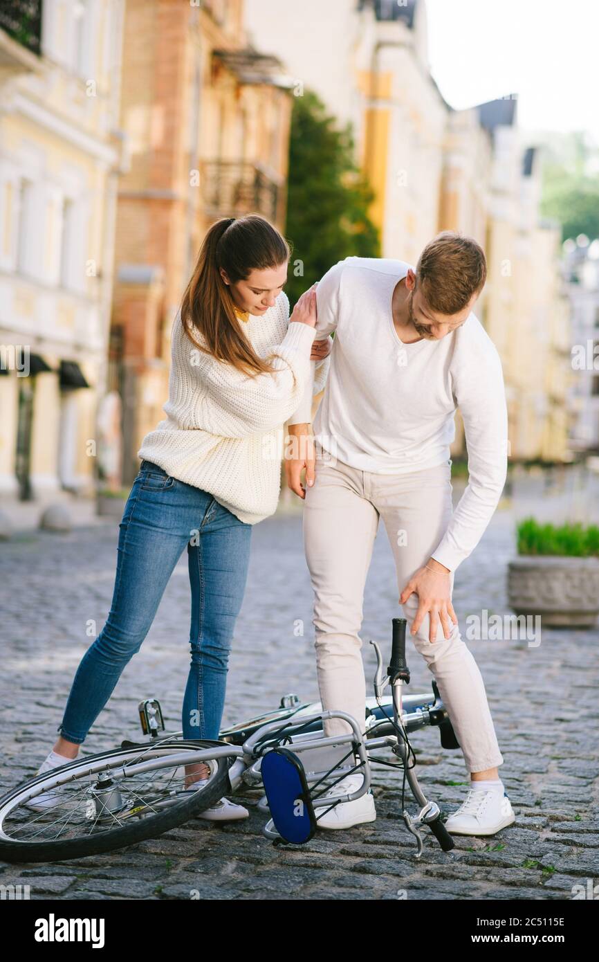 Woman standing over man lying down hi-res stock photography and images ...