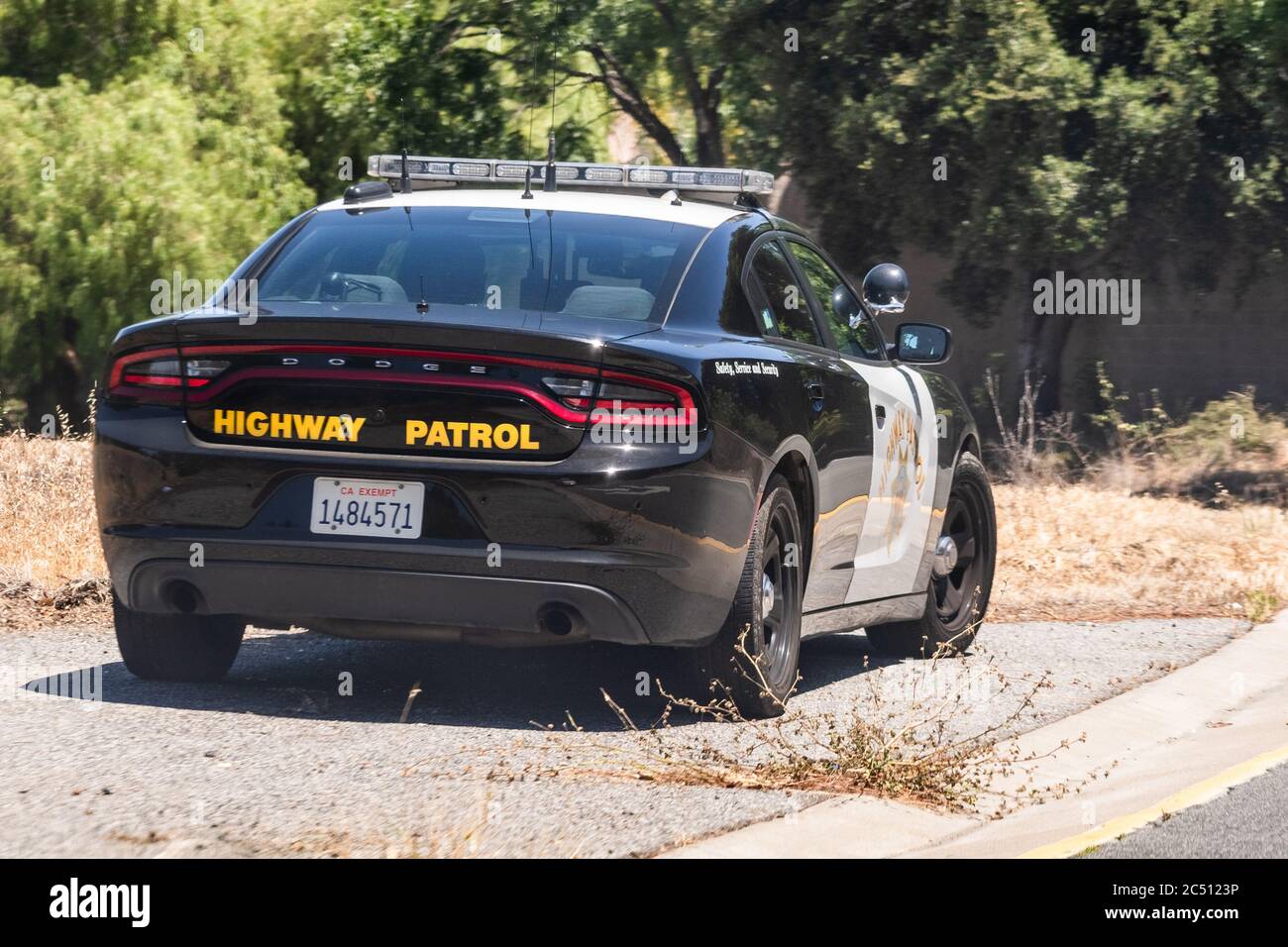 June 14, 2020 Mountain View / CA / USA - Highway Patrol vehicle parked on the left side of a ...