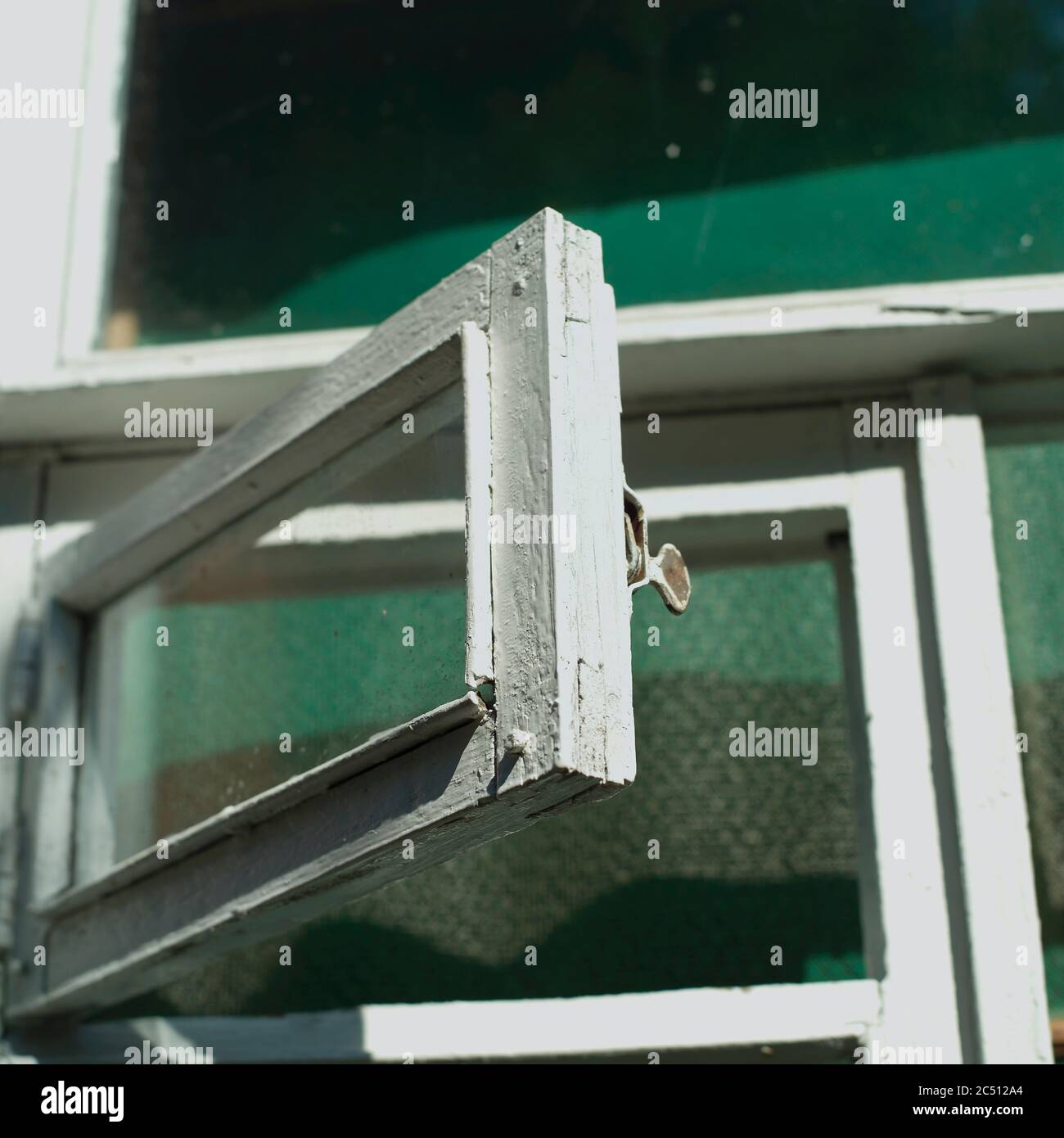Open window leaf and an anti insects mesh in the background, outdoor ...