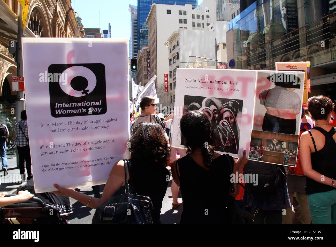 People march along George Street in the centre of Sydney on the ...