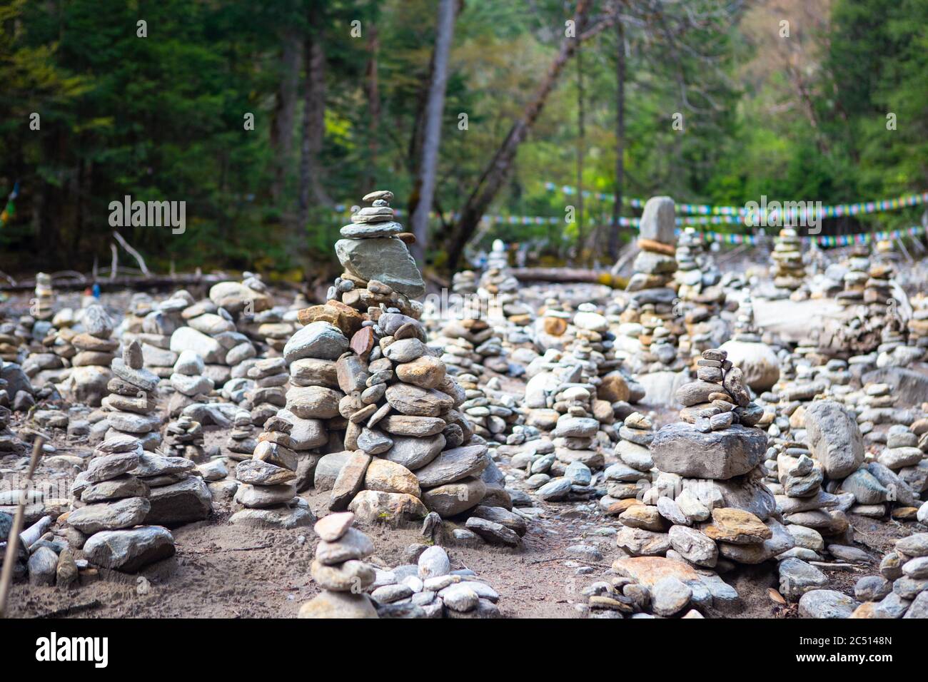 Mani pile, a stack of rocks to pray in Tibet, China Stock Photo - Alamy