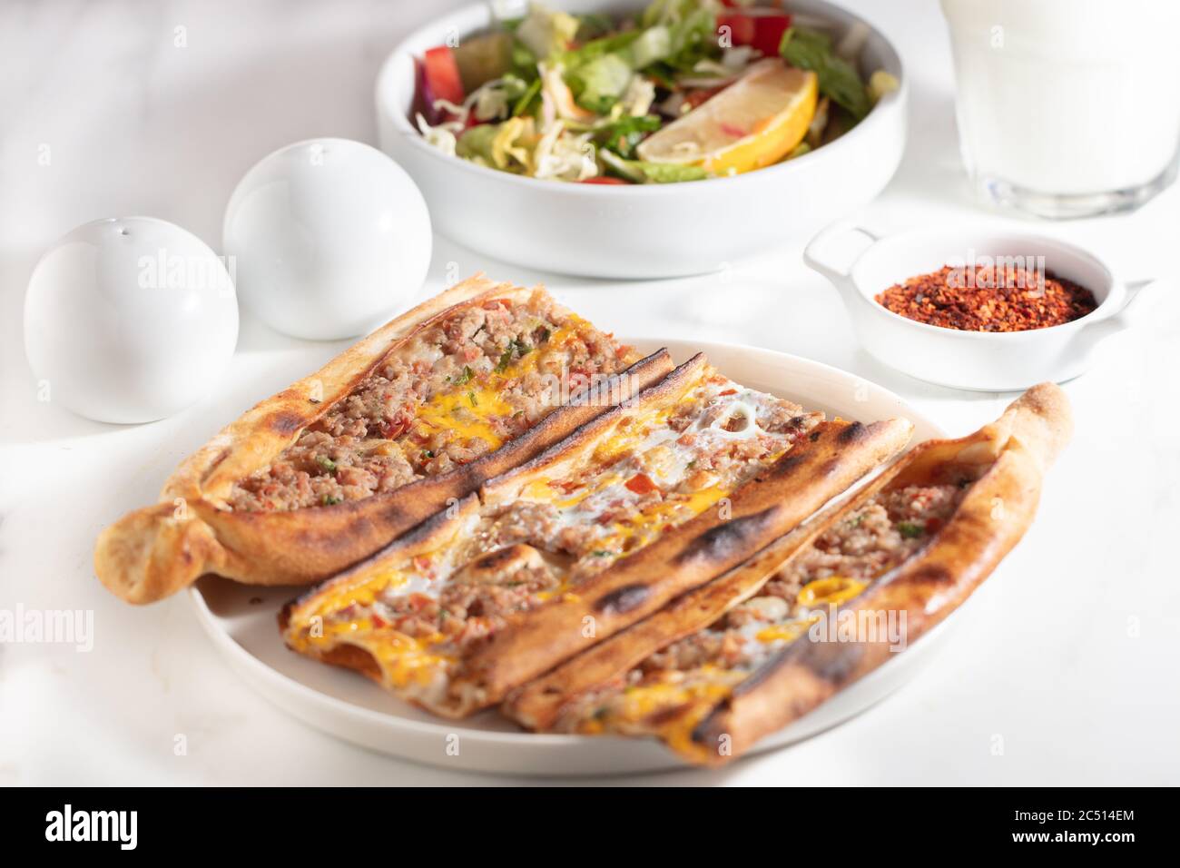 Traditional Turkish pide with meat and egg Stock Photo - Alamy