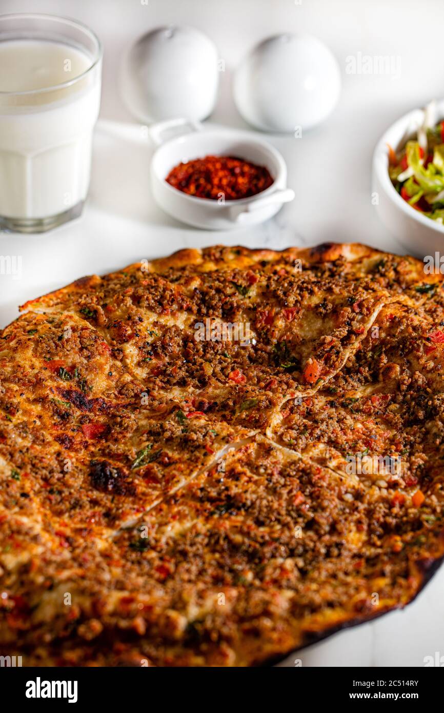 Turkish foods ,Turkish pizza, Lahmacun with red pepper Stock Photo - Alamy