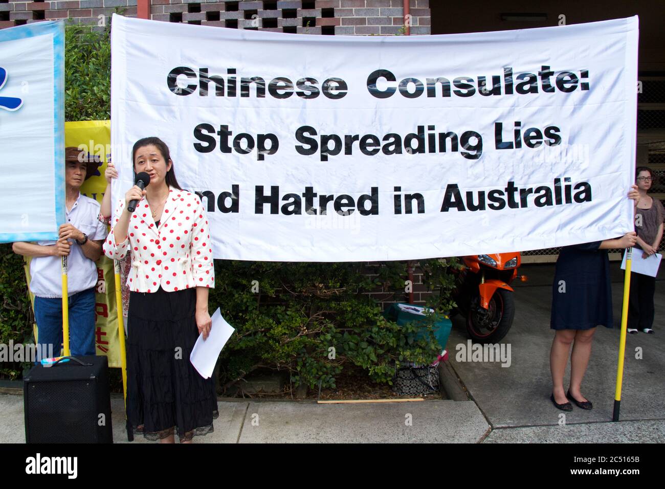 Dr Lucy Zhao speaks at the Falun Gong protest outside the Chinese ...