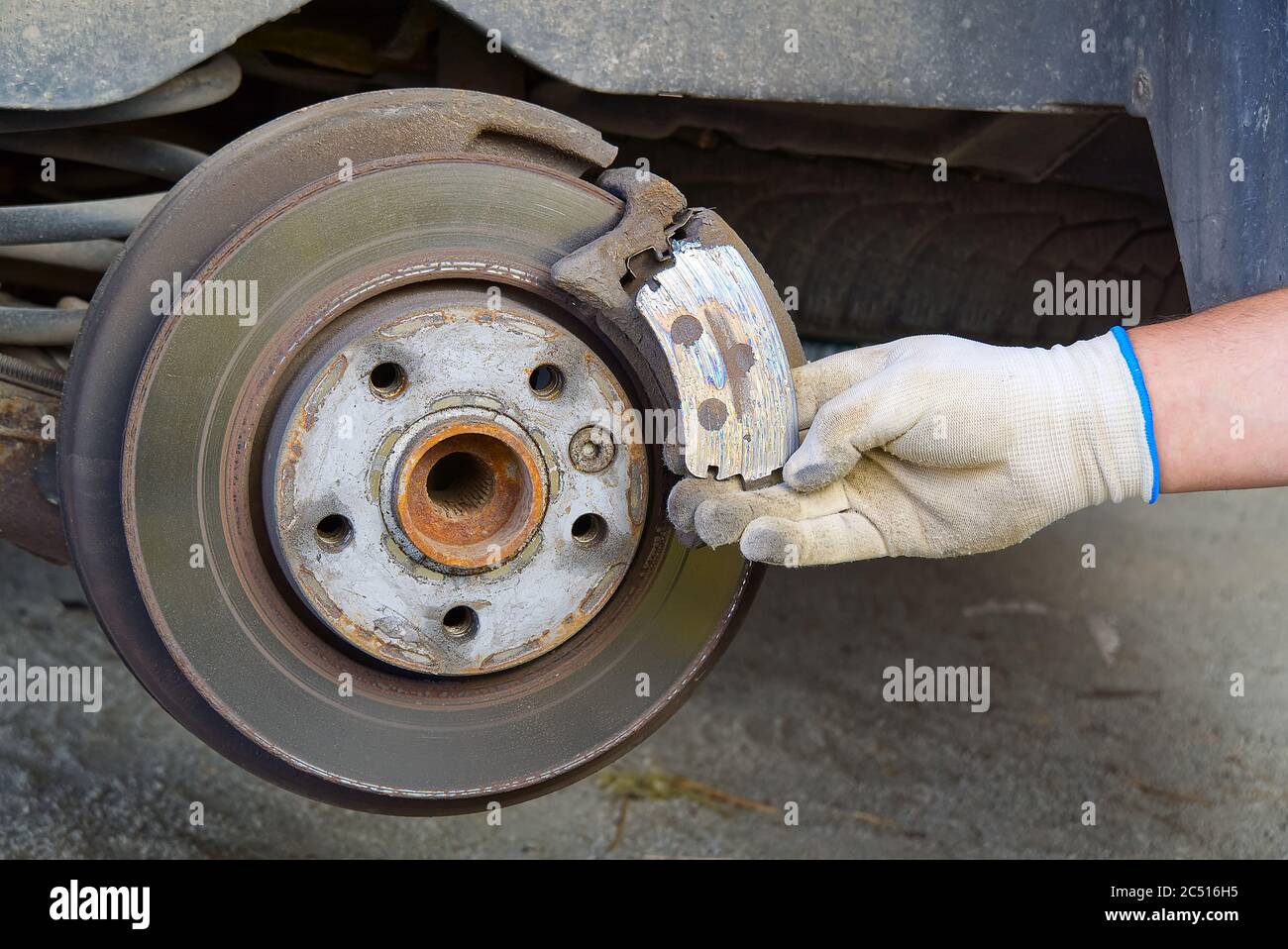 Old and dirty rear dump break of the vehicle for repair. Brakes on a ...