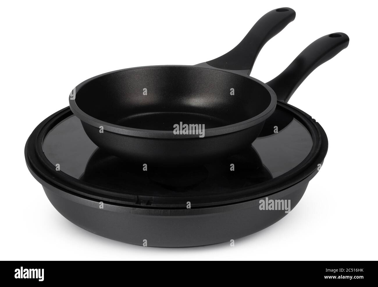 Set of new black pans isolated on white Stock Photo - Alamy