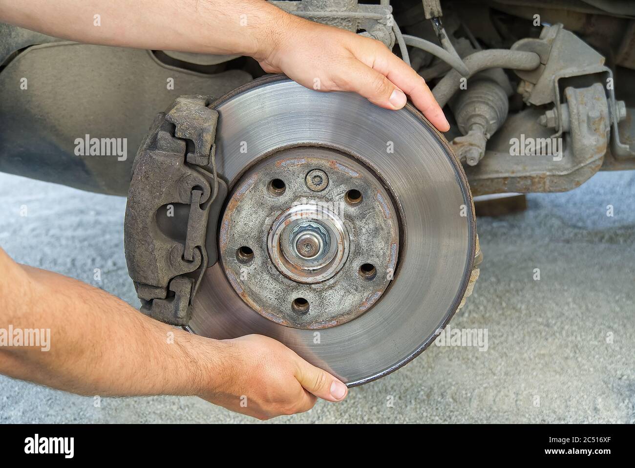 Old and dirty rear dump break of the vehicle for repair. Brakes on a ...