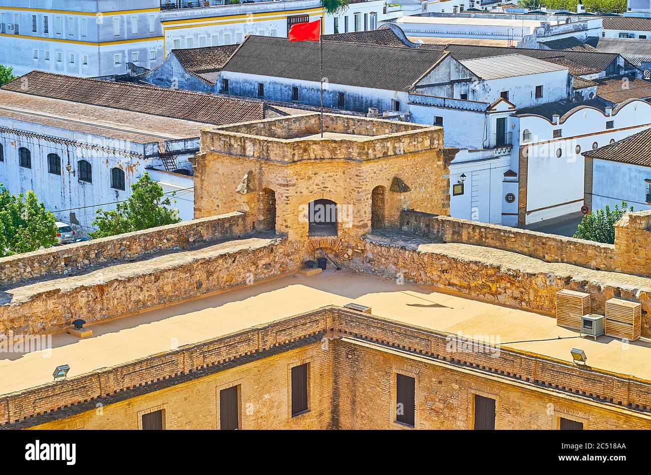 The keep of Castillo de Santiago castle overlooks the watchtowers ...