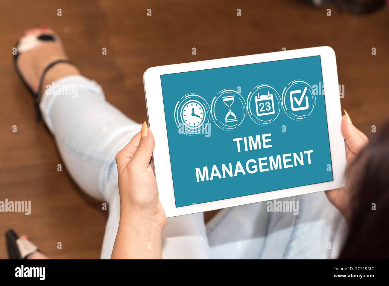 Tablet screen displaying a time management concept Stock Photo - Alamy