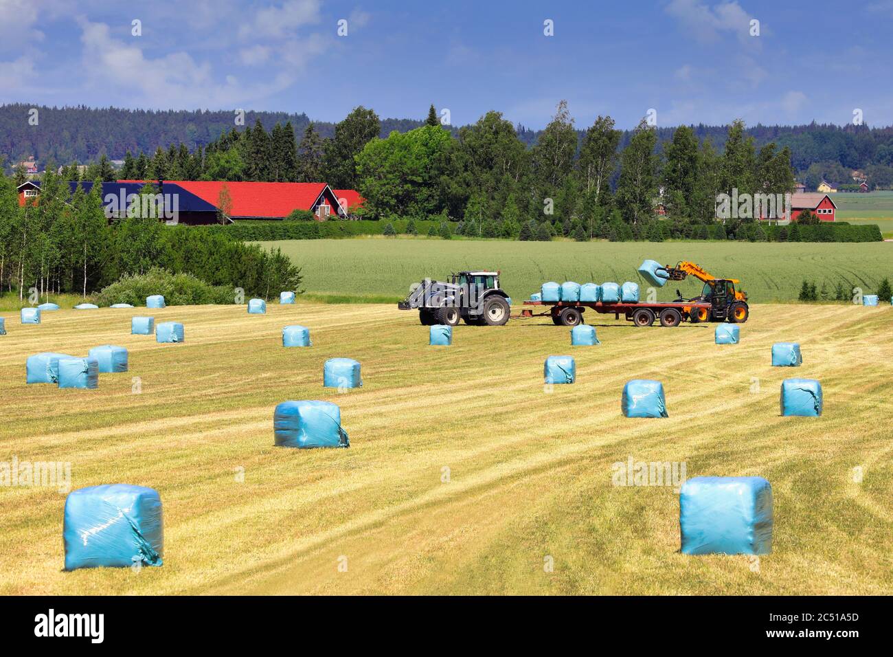 Telescopic handler stacking bales hi-res stock photography and images ...