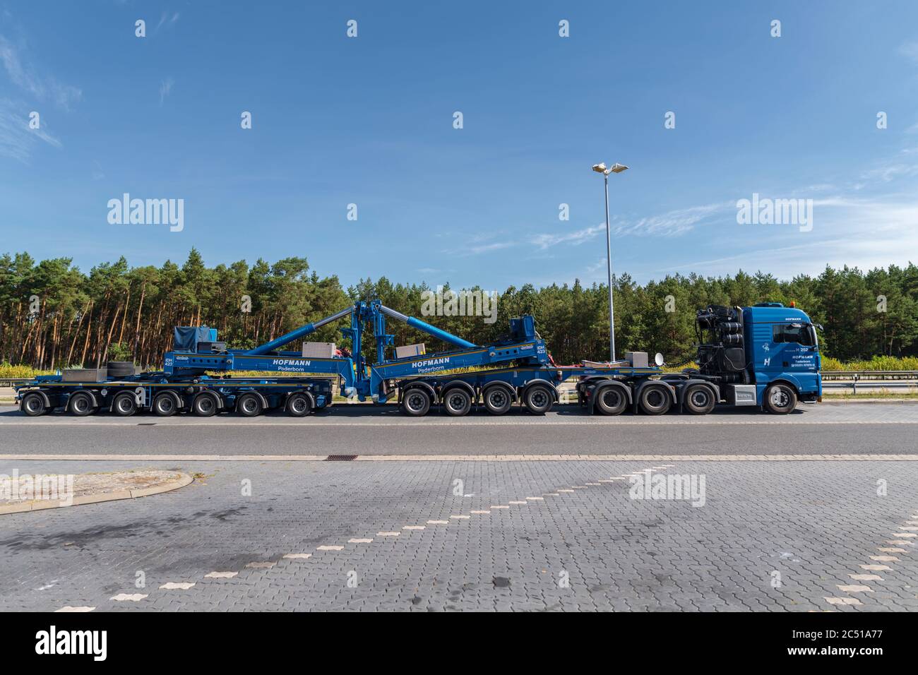 Special heavy load transporter on the parking lot of a German motorway ...