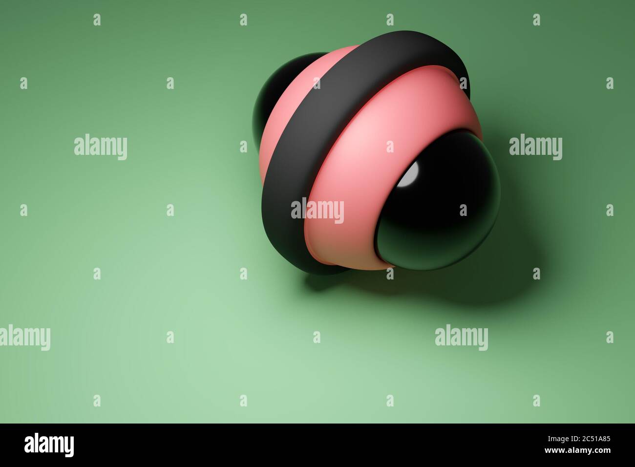 3D rendering of a black and pink gyroscope on a green background. A ...