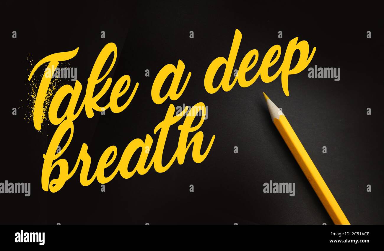 Take a Deep Breathe words in yellow lettering on black and pencil ...