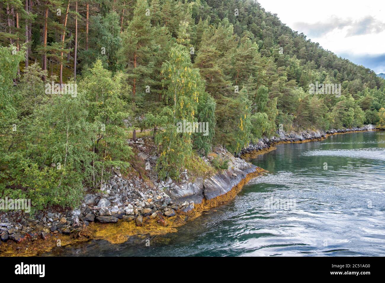 The beginning of the fall in Norwegian fjords Stock Photo - Alamy