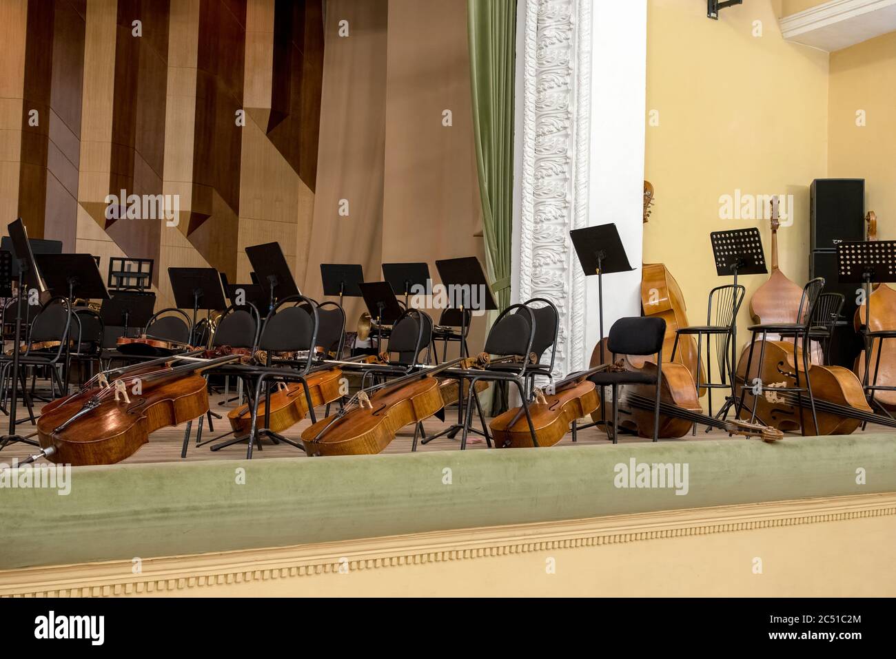 Musical instruments on the stage of the concert hall Stock Photo - Alamy