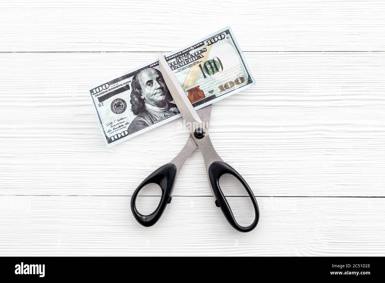 Decline of dollar exchange rate. Scissors cut dollars banknote Stock ...