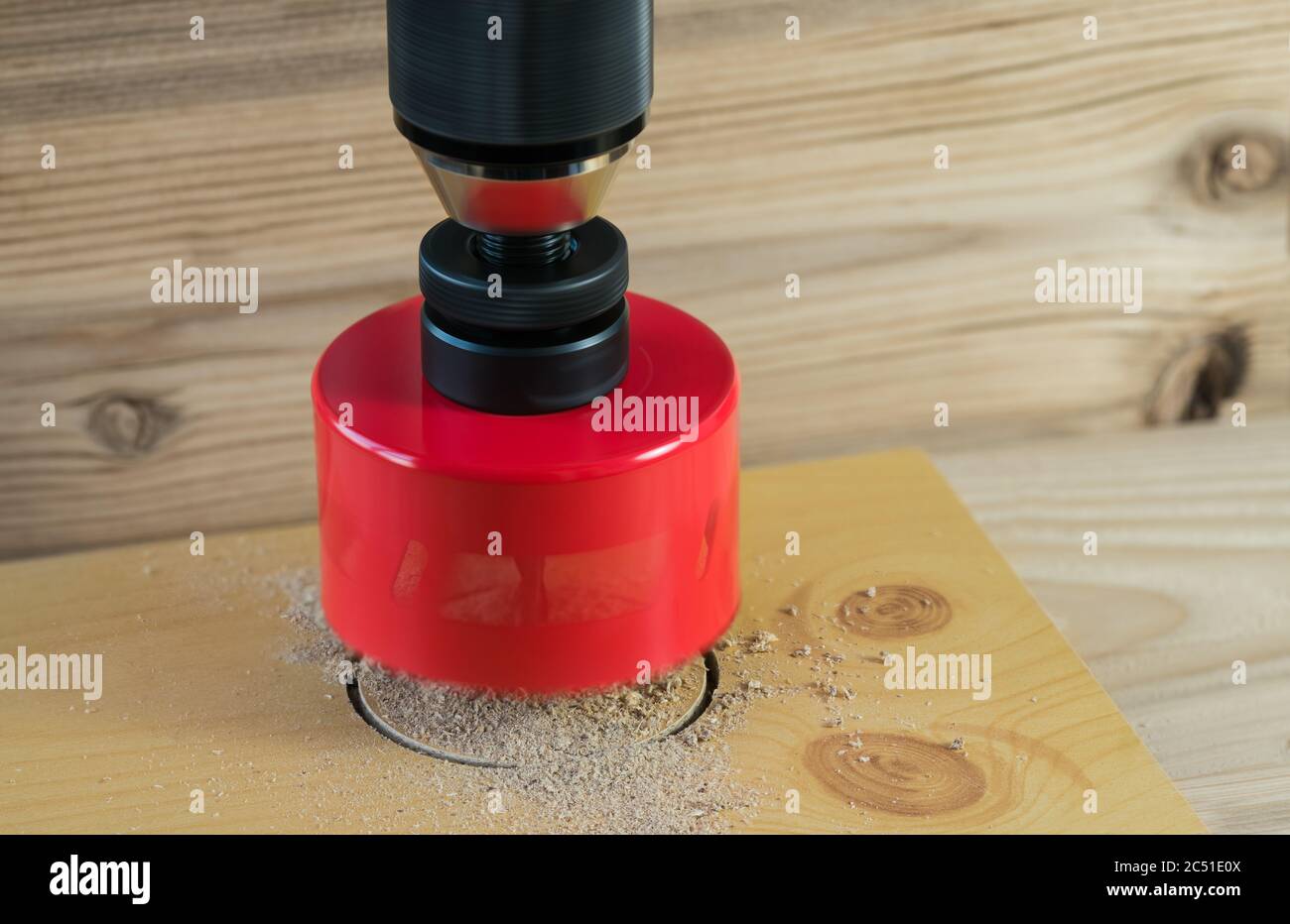 Rotating hole saw with pilot drill bit on wooden background. Drilling ...