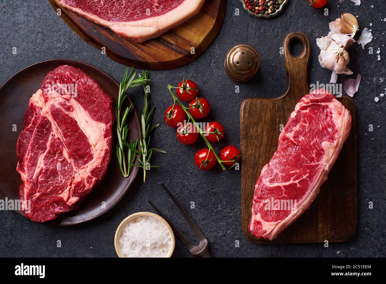 Top view variety of fresh Black Angus Prime raw beef steakes: striploin ...