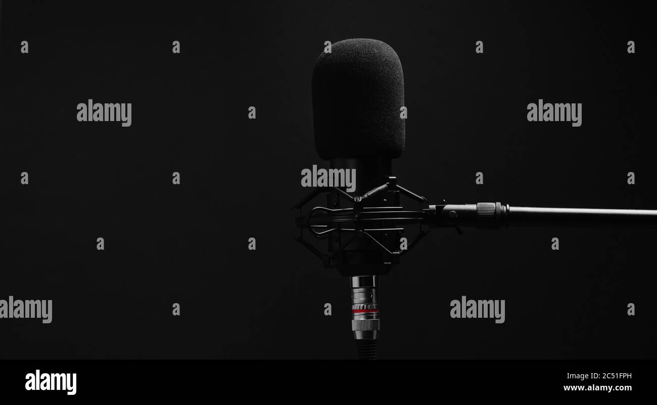studio black microphone in the dark room. Audio recording Stock Photo ...