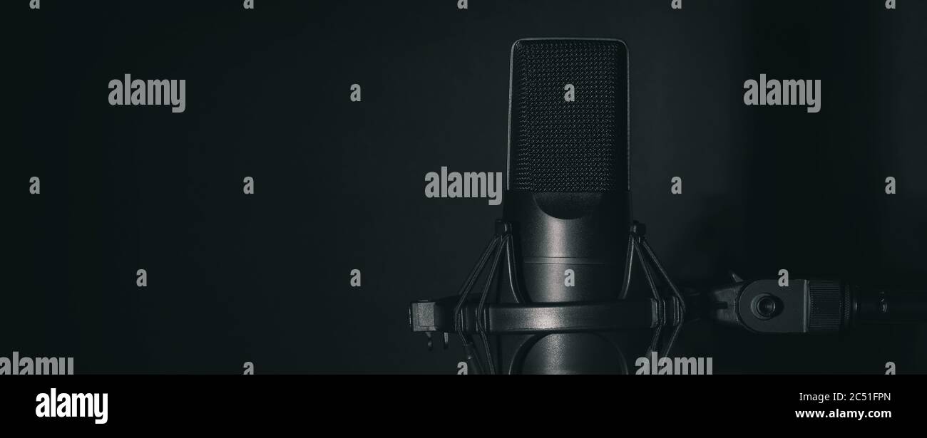 studio black microphone in the dark room. Audio recording Stock Photo ...