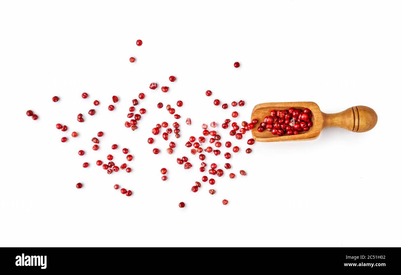 Red pepper grain with wooden scoop isolated on white background Stock ...
