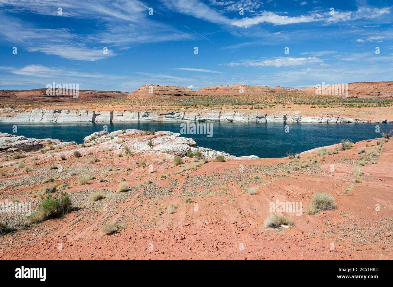 Shrinking water reservoir in the dry, red desert Stock Photo - Alamy