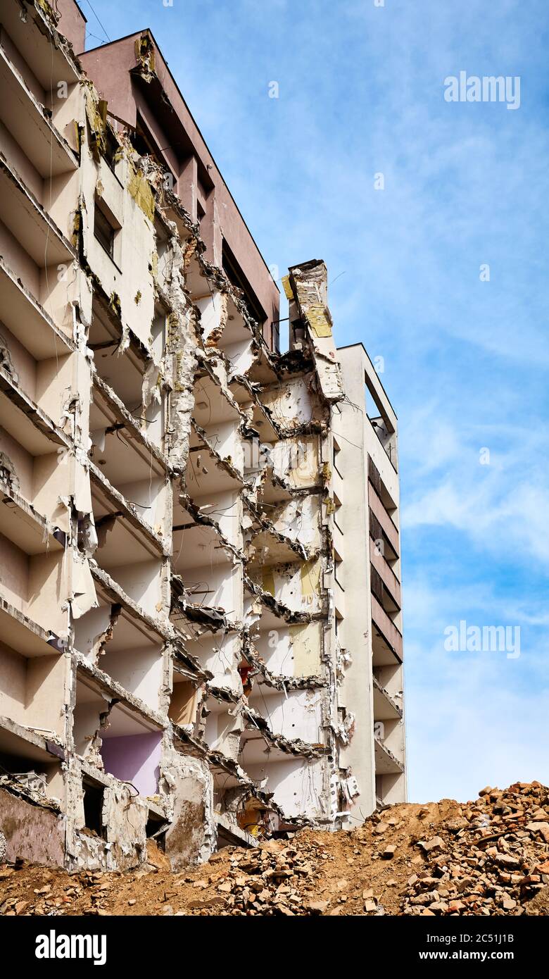 Demolished high rise building against the blue sky Stock Photo - Alamy