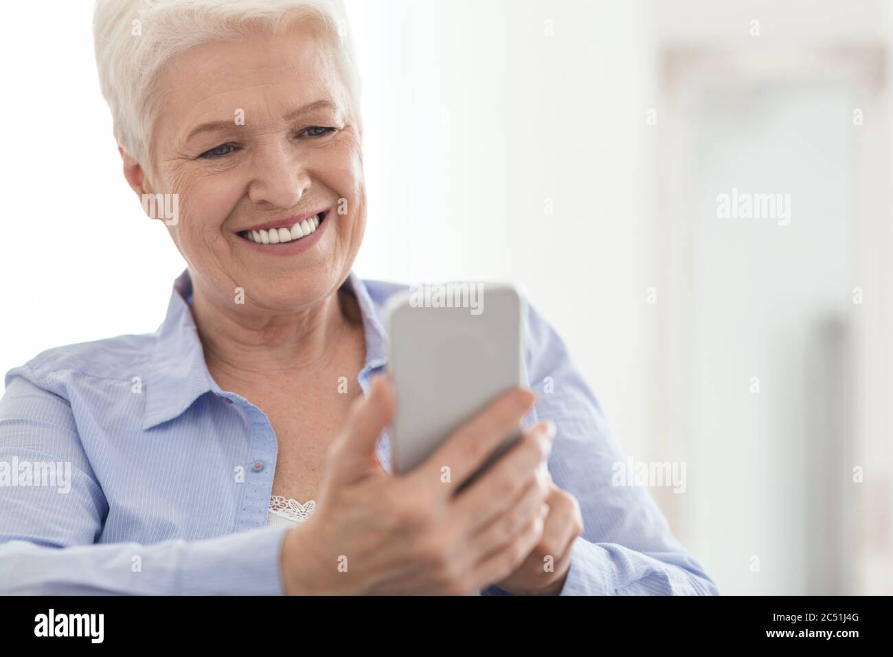 Online Banking App. Happy Senior Woman Using Smartphone, Checking Her ...