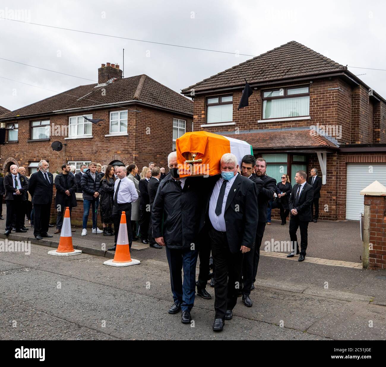 Members of the Storey family carry the coffin of senior Irish ...