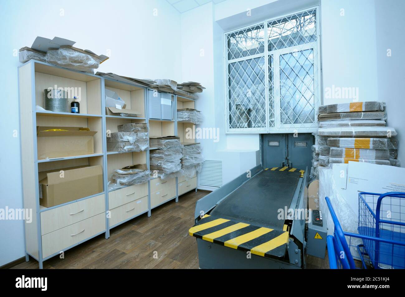At the post office, view of the receipt and delivery room: belt ...