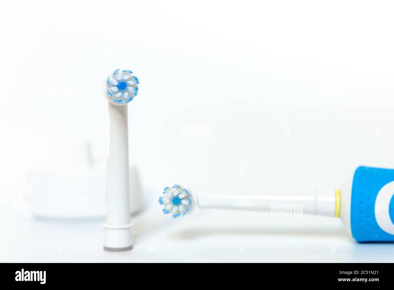 Electric toothbrush on a white background Stock Photo - Alamy