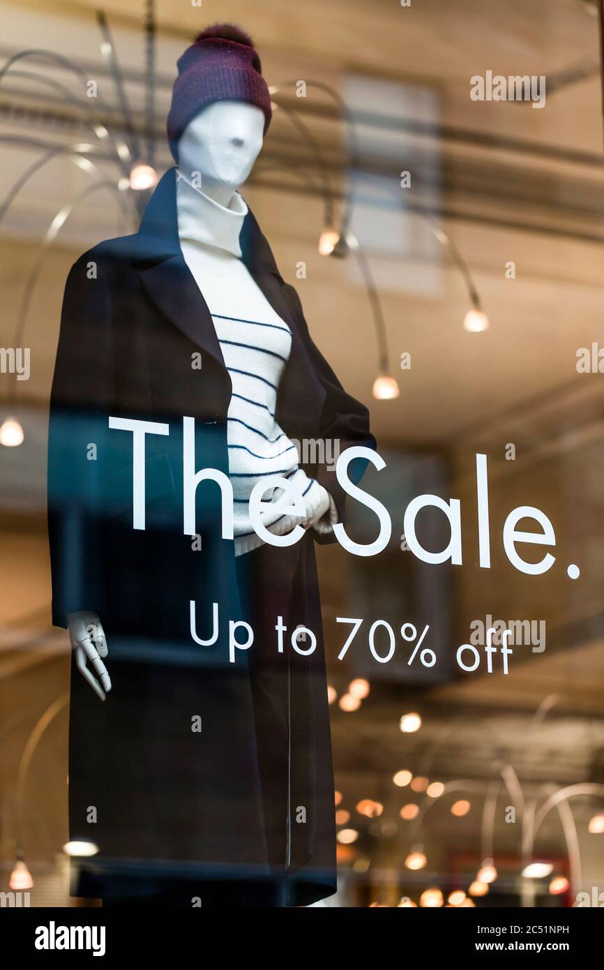 Sale signs in a clothing shop window, Scotland, UK Stock Photo - Alamy