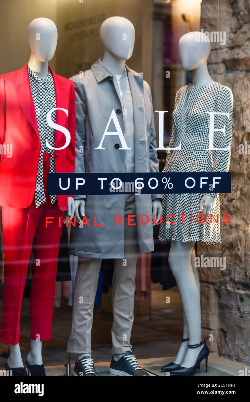 Sale signs in a clothing shop window, Scotland, UK Stock Photo - Alamy