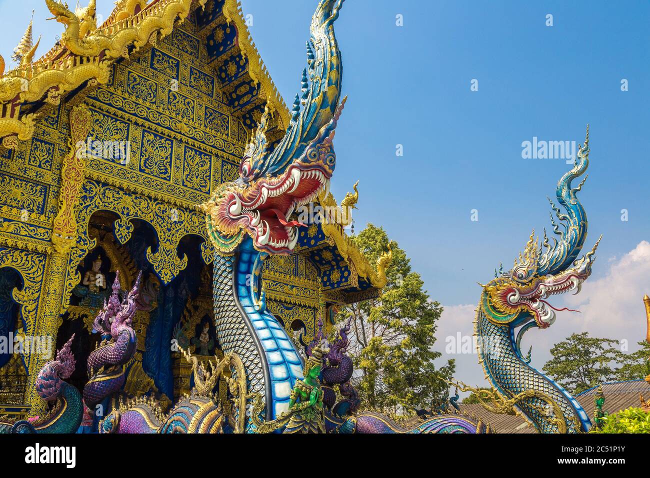 Wat Rong Sua Ten (Blue temple) in Chiang Rai, Thailand in a summer day ...
