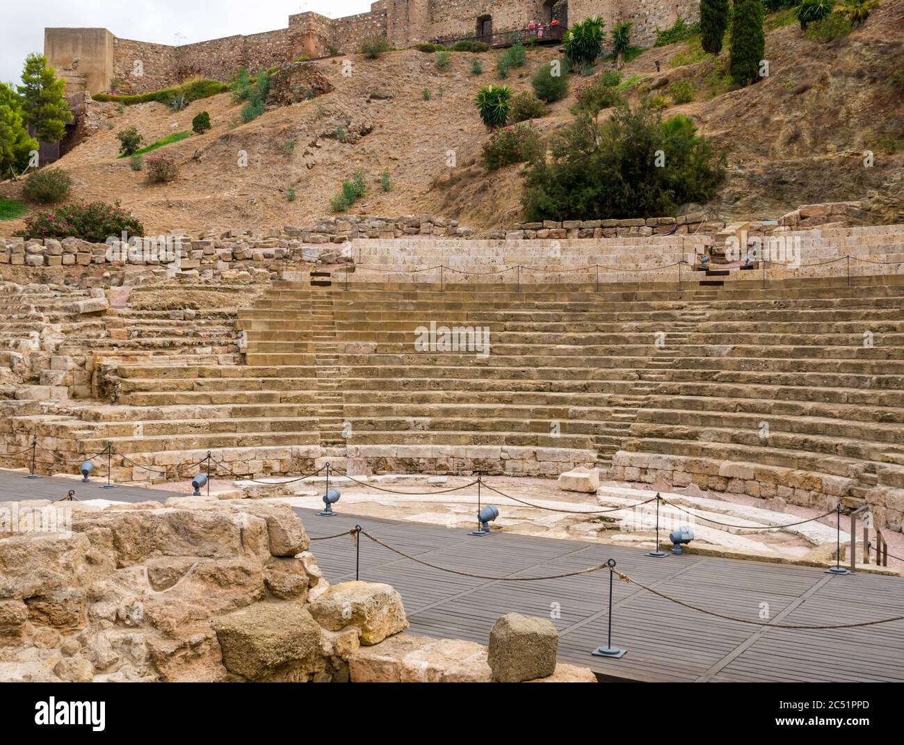 Roman amphitheatre below Alcazaba fortress, Malaga, Andalusia, Spain ...