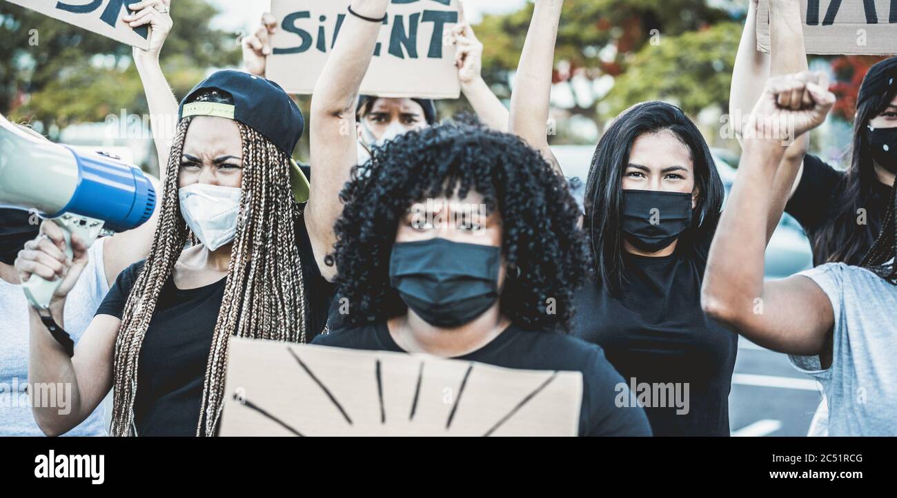 People from different culture and races protest on the street for equal ...
