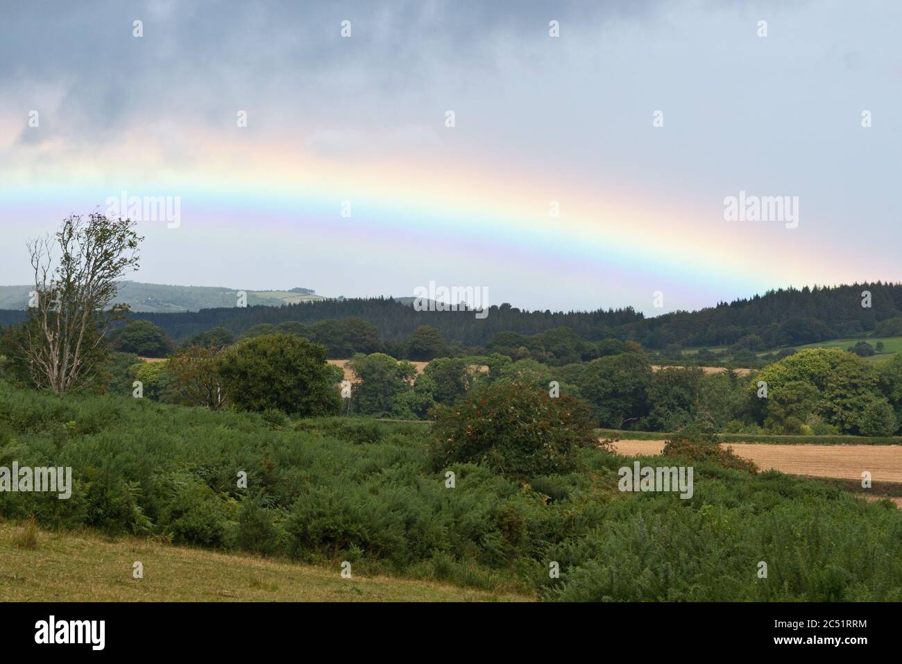 A rainbow over Rodhuish Common near Withycombe in the Exmoor National ...
