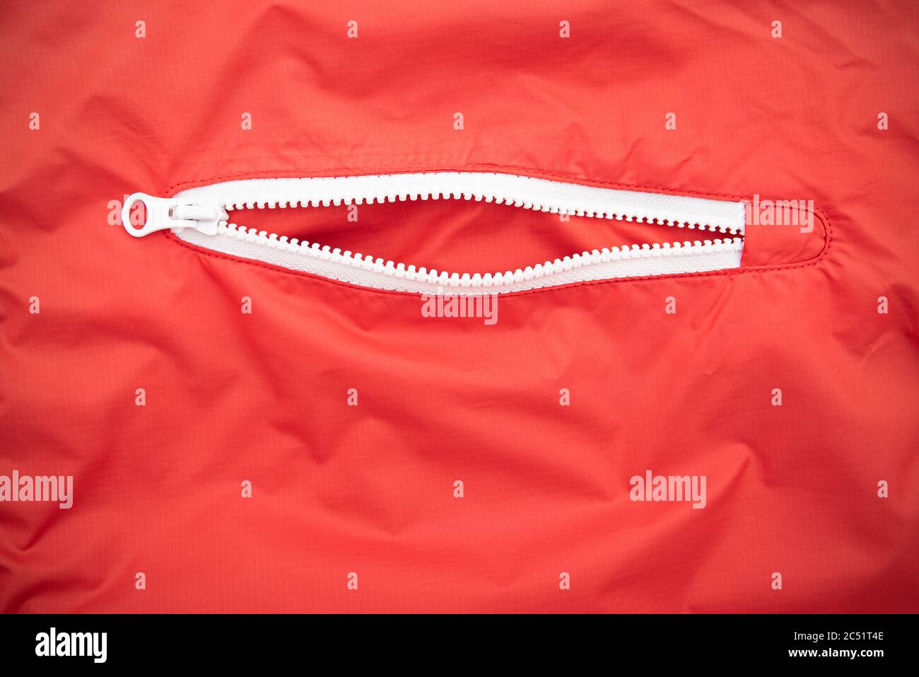 Red rain jacket hi-res stock photography and images - Alamy
