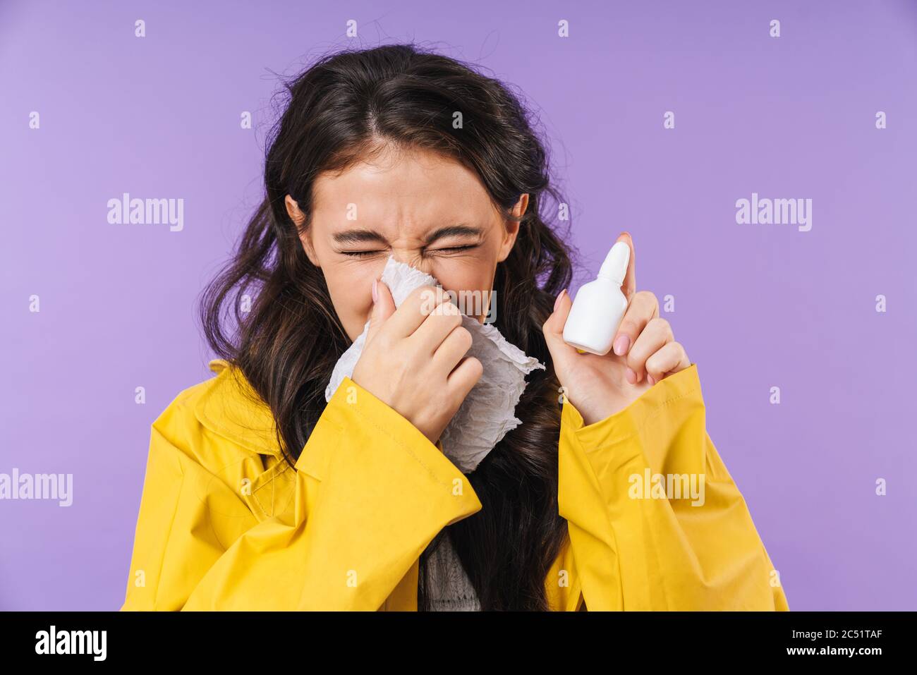 Image of ill sick woman isolated over purple wall background holding ...