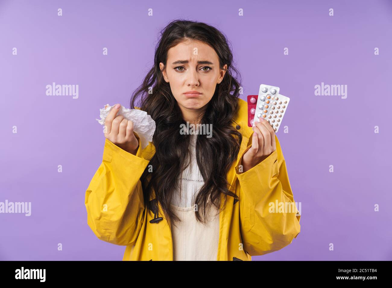 Image of ill sick woman isolated over purple wall background holding ...