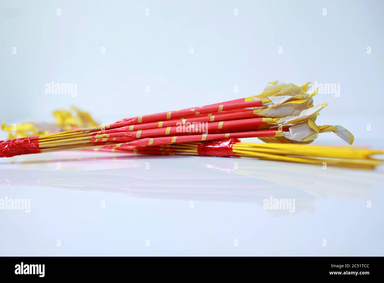 Red and yellow fireworks isolated on a white background Stock Photo - Alamy
