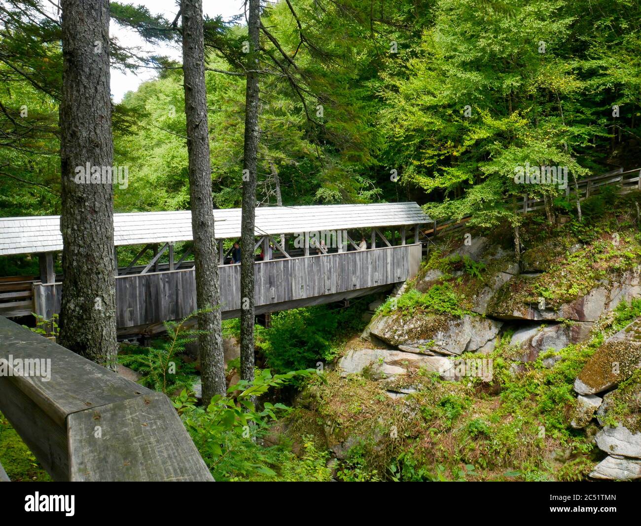 Sentinel Pine Covered Bridge over gorge, Franconia Notch State Park ...