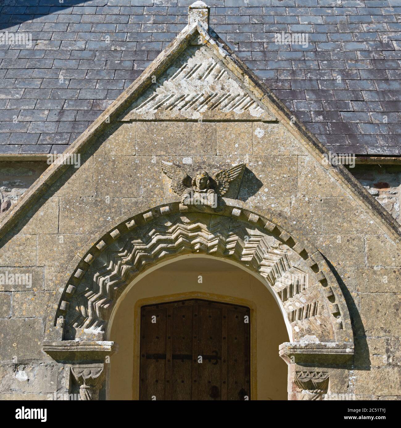 Ornate carvings and decoration around the entrance porch of St Andrews ...