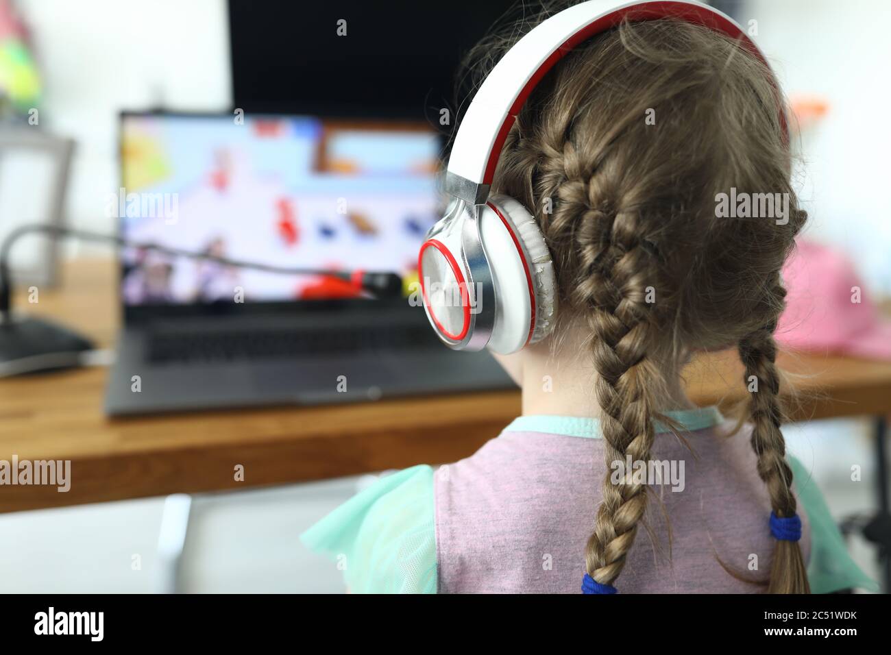 Kid playing computer game Stock Photo - Alamy