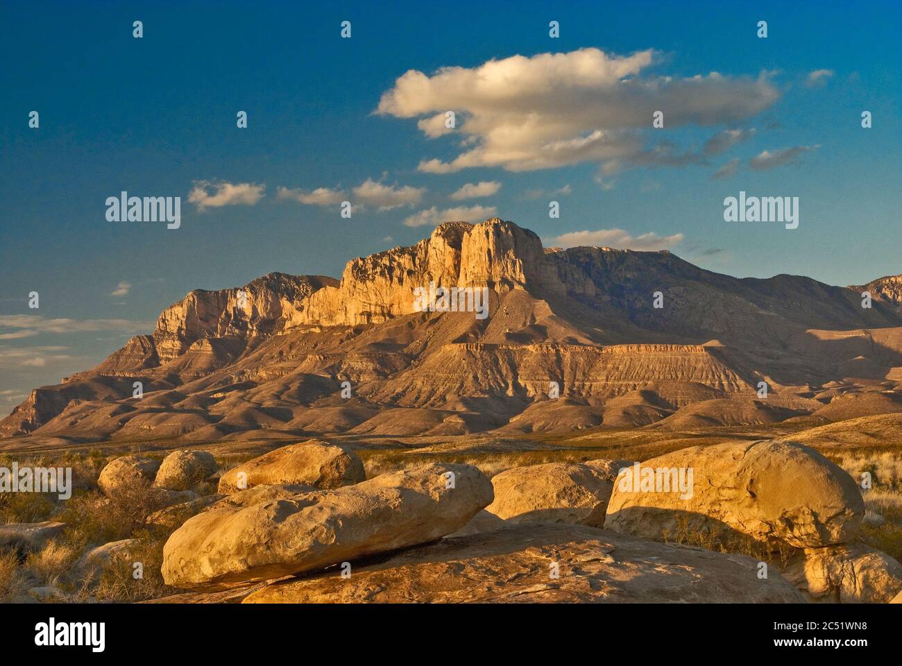 Limestone boulders, western escarpment of Guadalupe Mountains at sunset ...