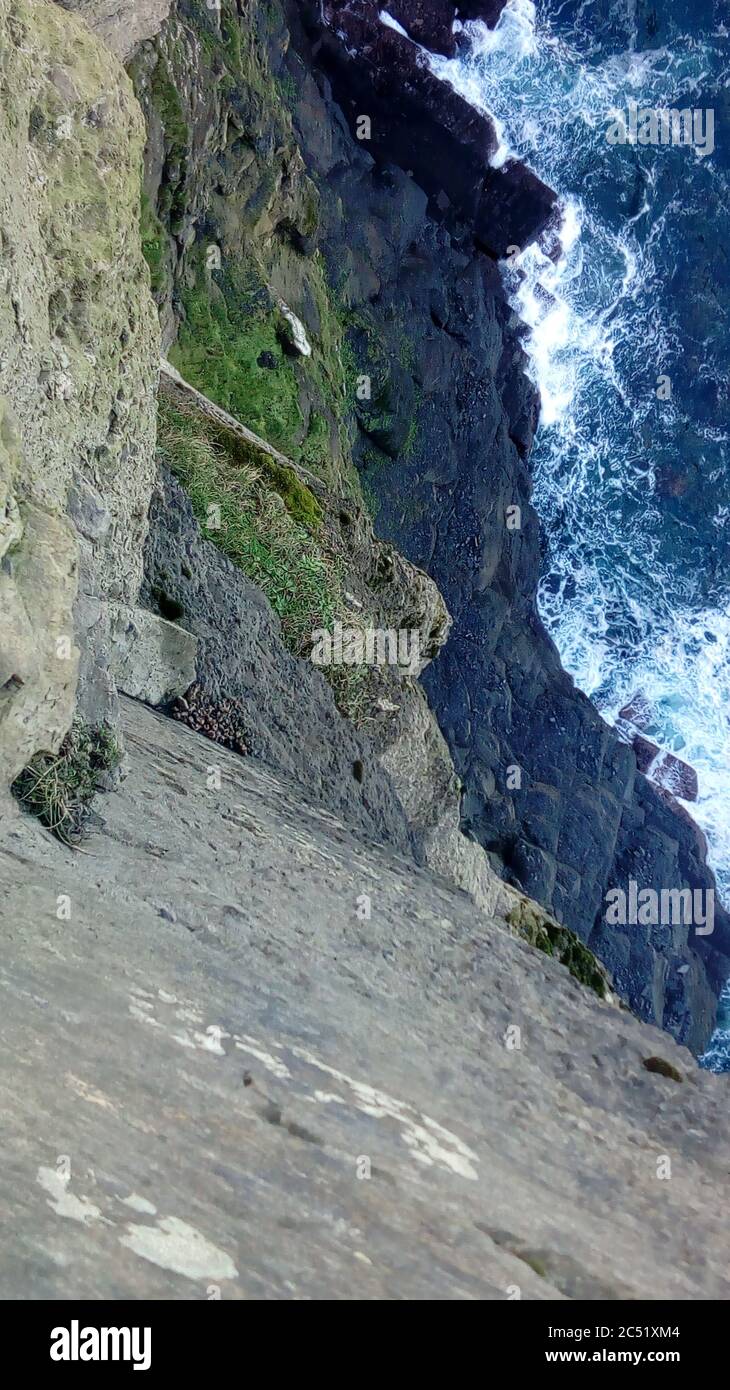 Aerial view from a cliff capturing the angry waves Stock Photo - Alamy