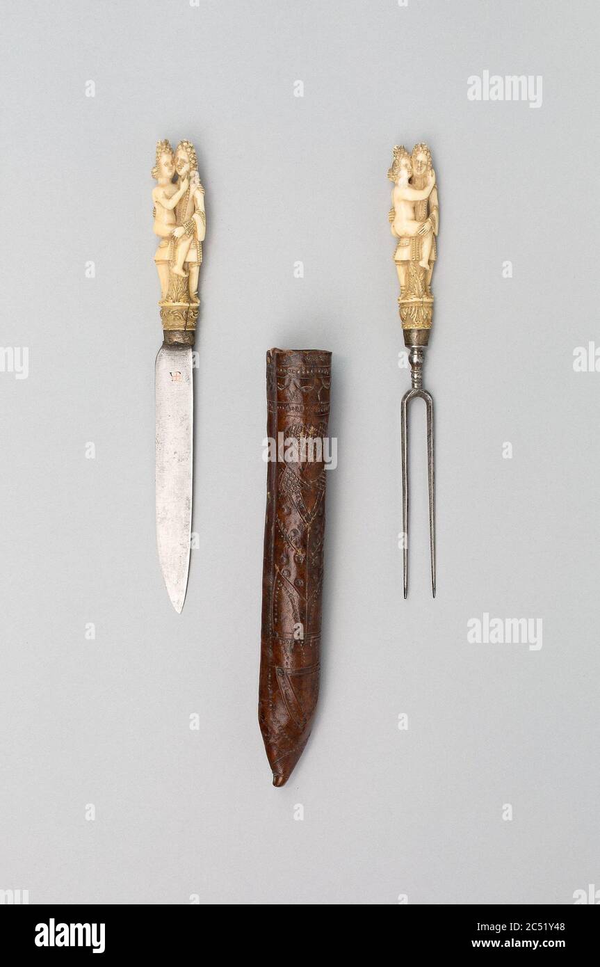 Vertical shot of ancient medieval tools on a gray background Stock ...