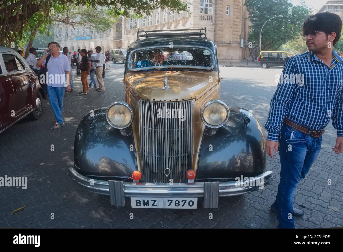 In the course of an annual vintage car rally in Mumbai, India, a ...